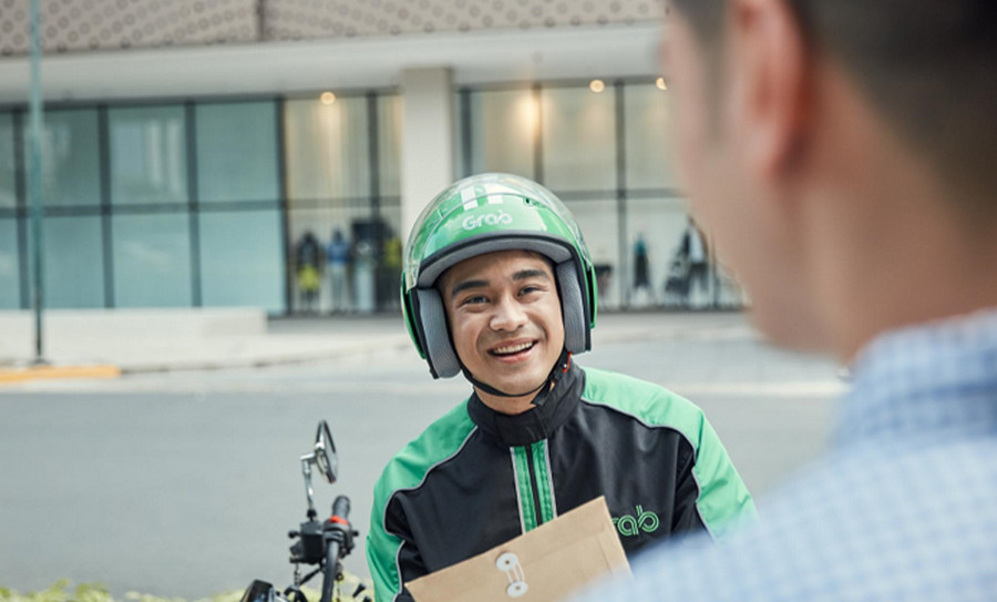 Grab Bersama OTO Group Ringankan Angsuran Mitra Pengemudi - Trendtech ...